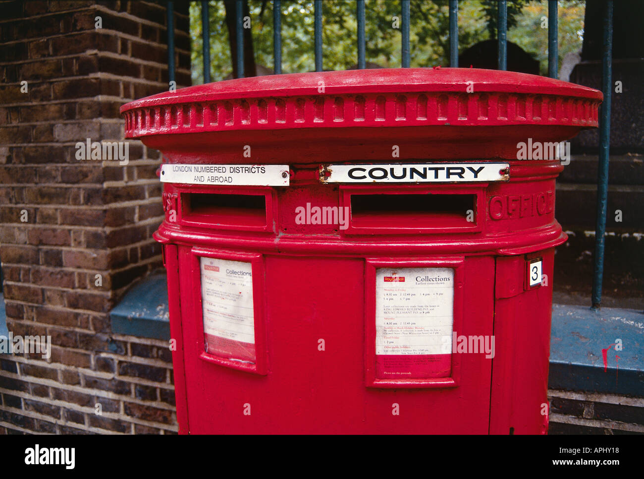 Red letterbox london hi-res stock photography and images - Alamy