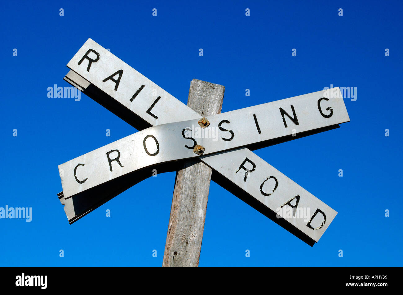 Railroad crossing sign with bright blue background, Kingston, New York ...