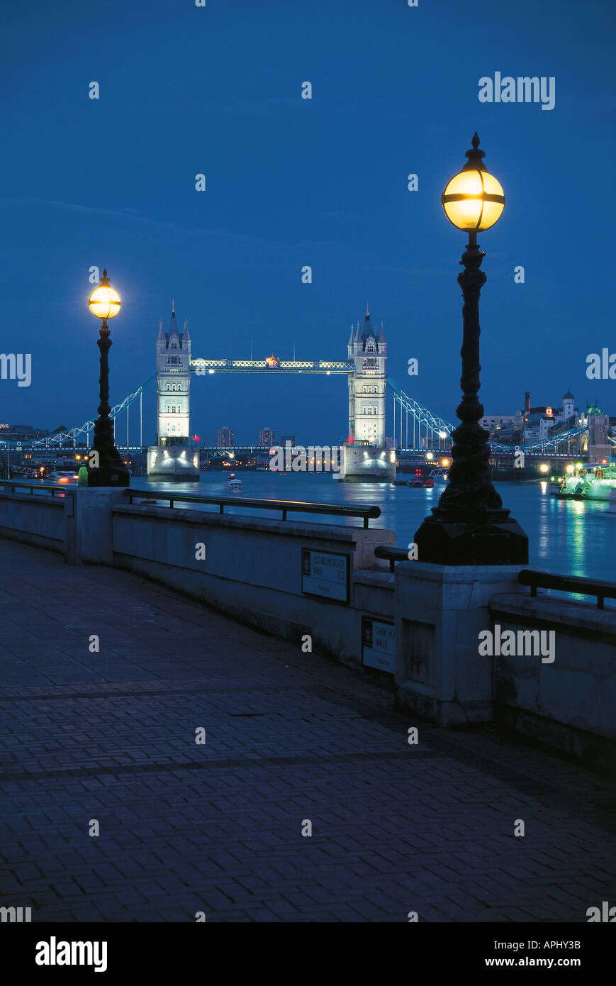 View between two street lamps of Tower Bridge floodlit at night from a ...