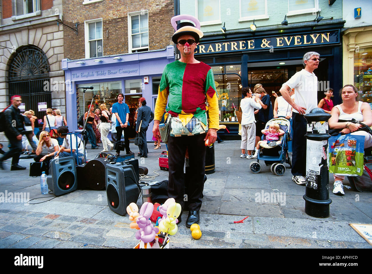A clown like street performer Covent Garden London England Stock Photo ...