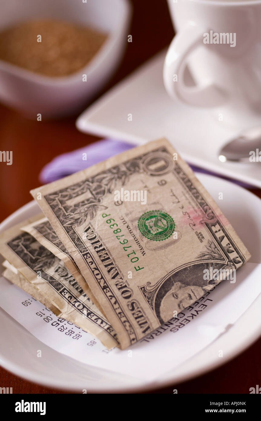 Tip left in cafe Stock Photo - Alamy