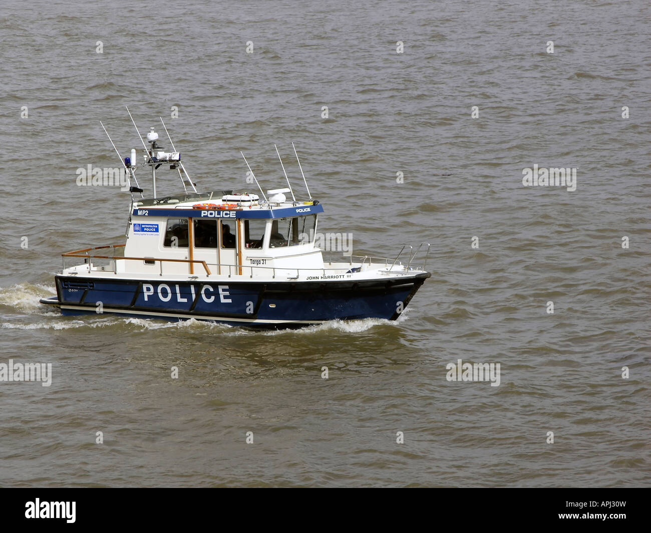 Police Launch on the Thames Stock Photo - Alamy