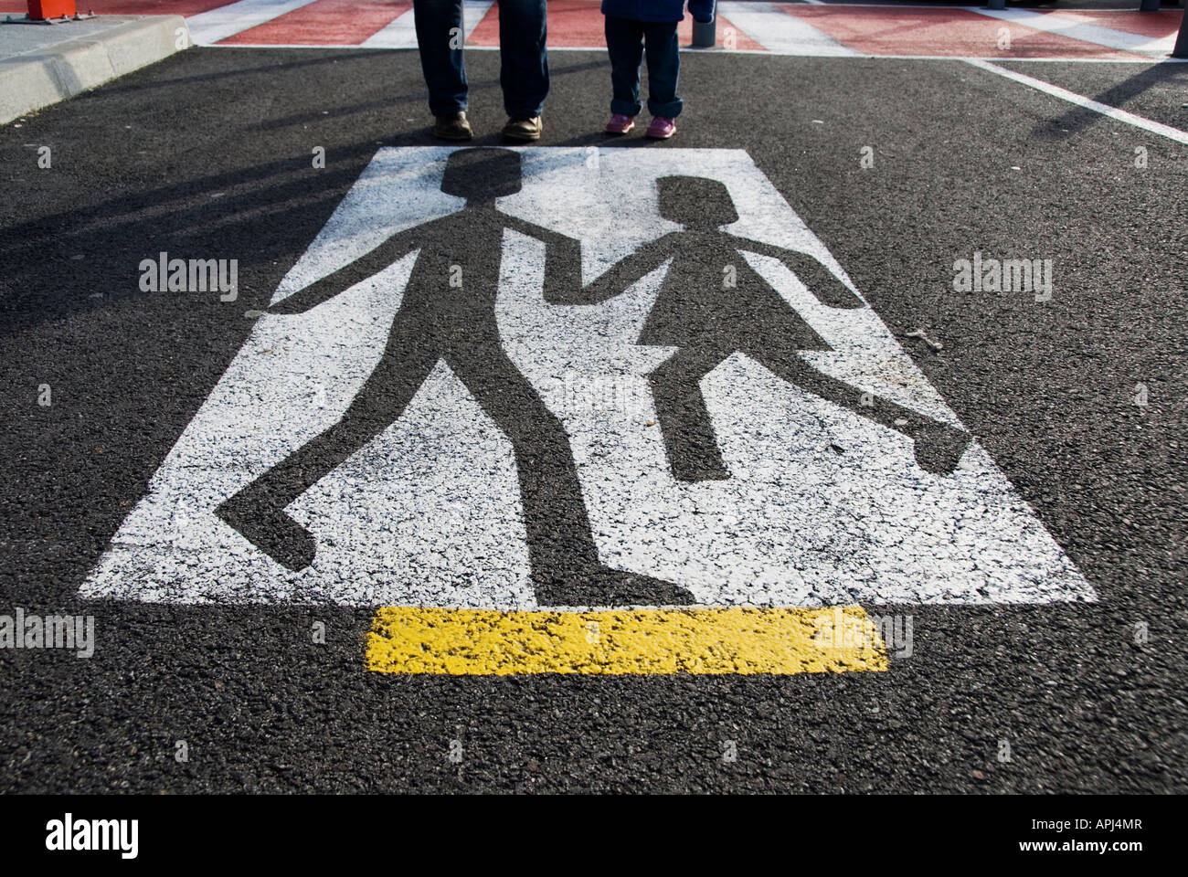 Stock Photo of a mum and her two year old child walking over the ...