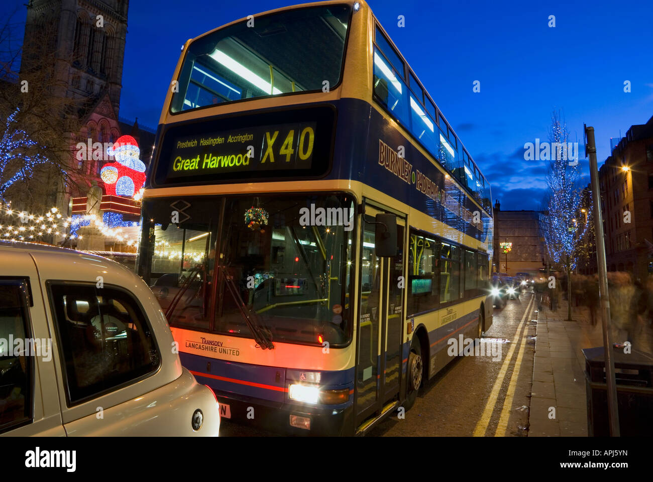 Double-decker bus in Manchester Stock Photo - Alamy