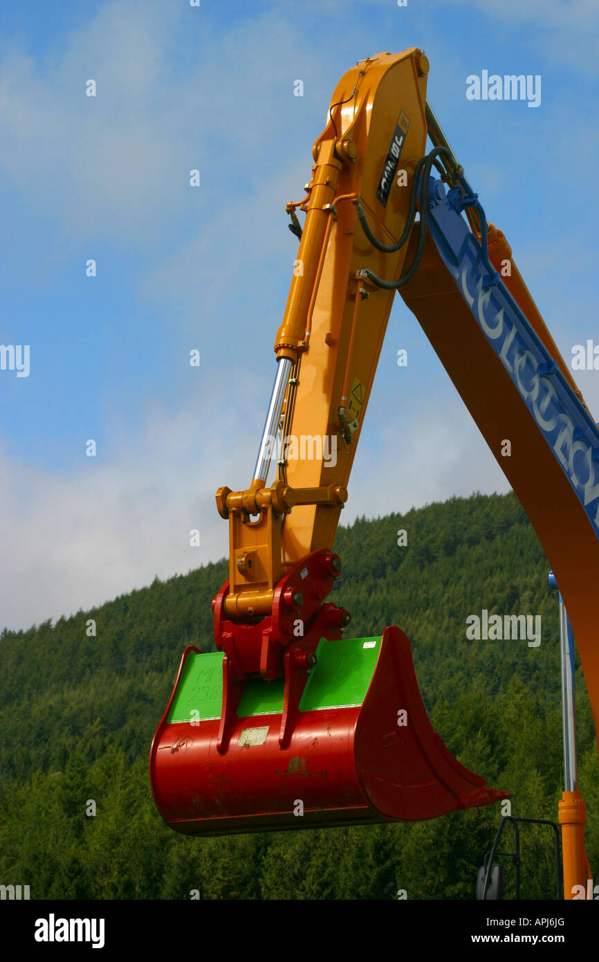 Boom arm and bucket of excavator Stock Photo - Alamy
