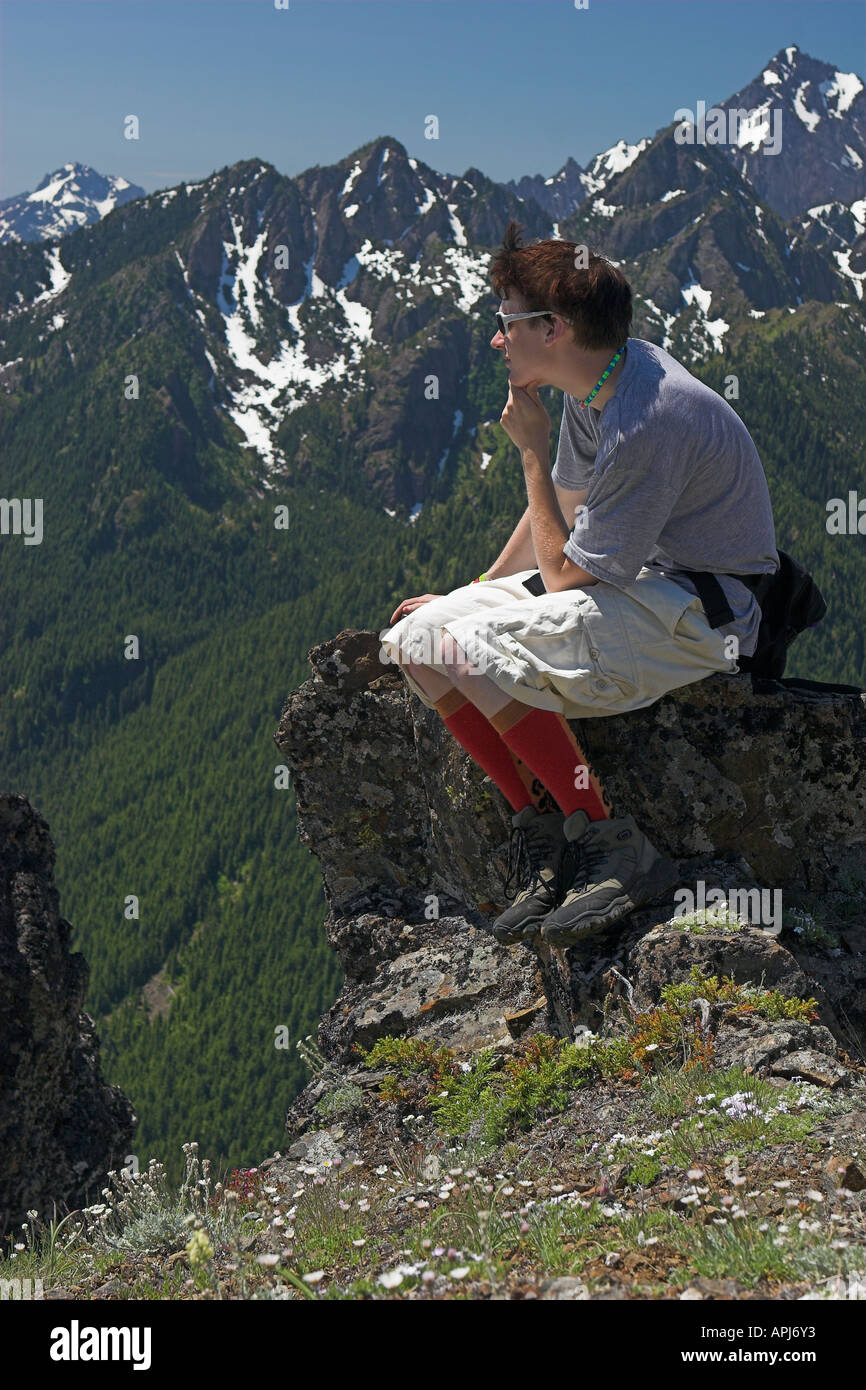 Teen hiker thinking in the Olympic Mountains Stock Photo - Alamy