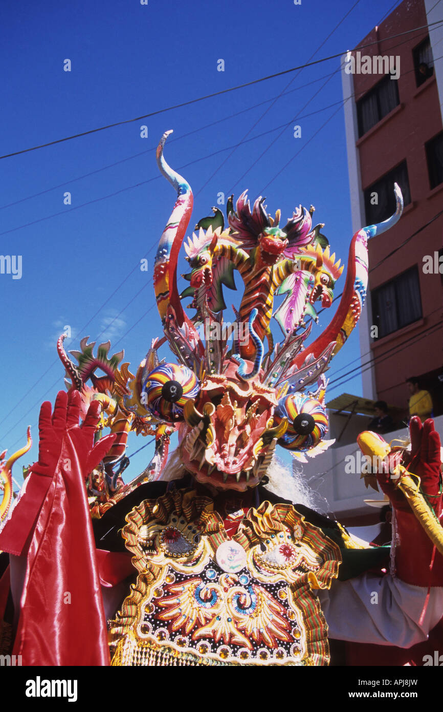 Portrait of a masked devil dancer wearign a spectacular mask during the ...