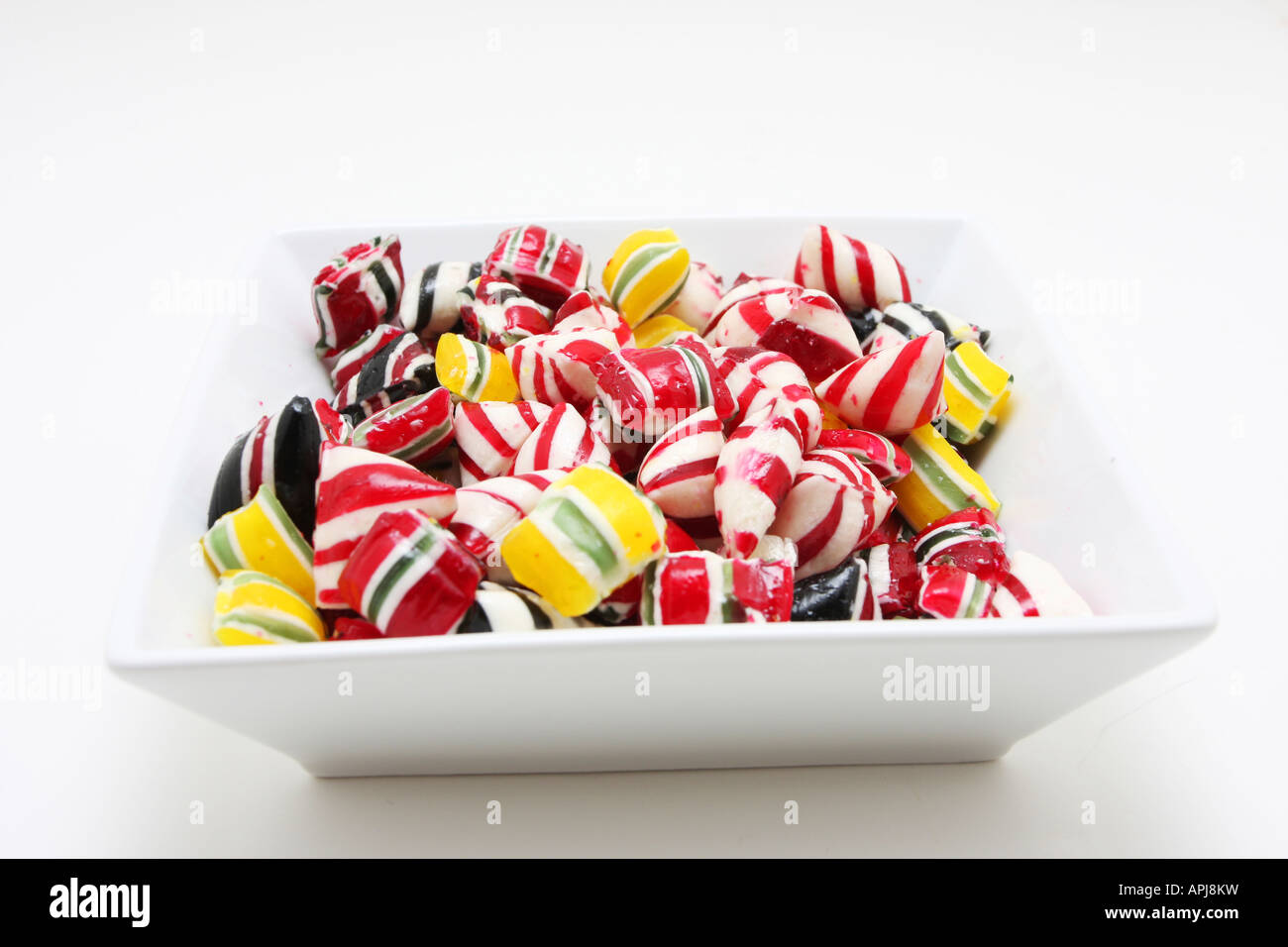 A bowl of hard peppermint candies Stock Photo - Alamy