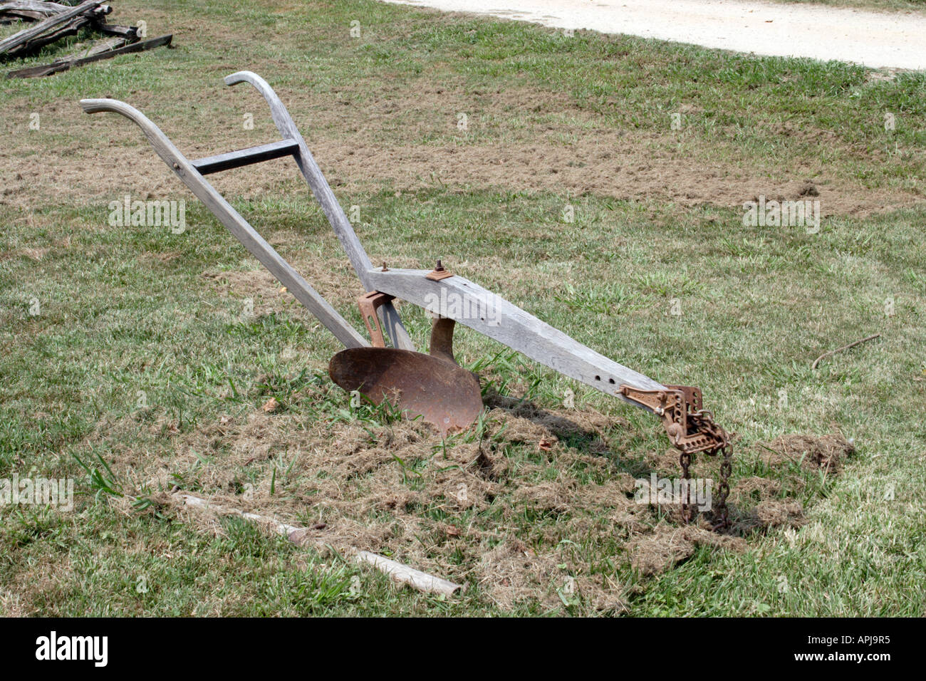 Plow in a field, ready for use. This is a side view Stock Photo - Alamy