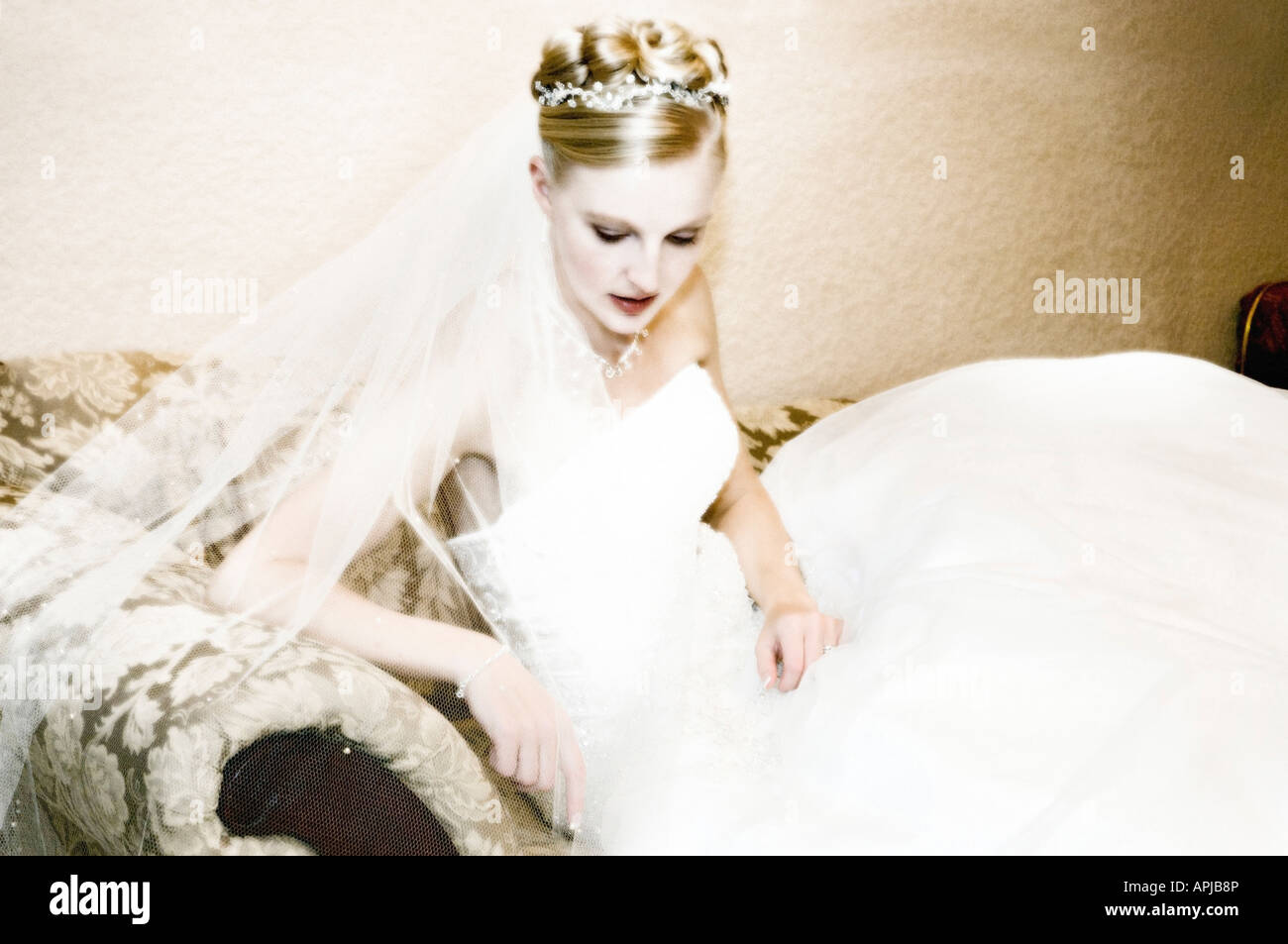 Bride relaxes on her wedding day Stock Photo - Alamy