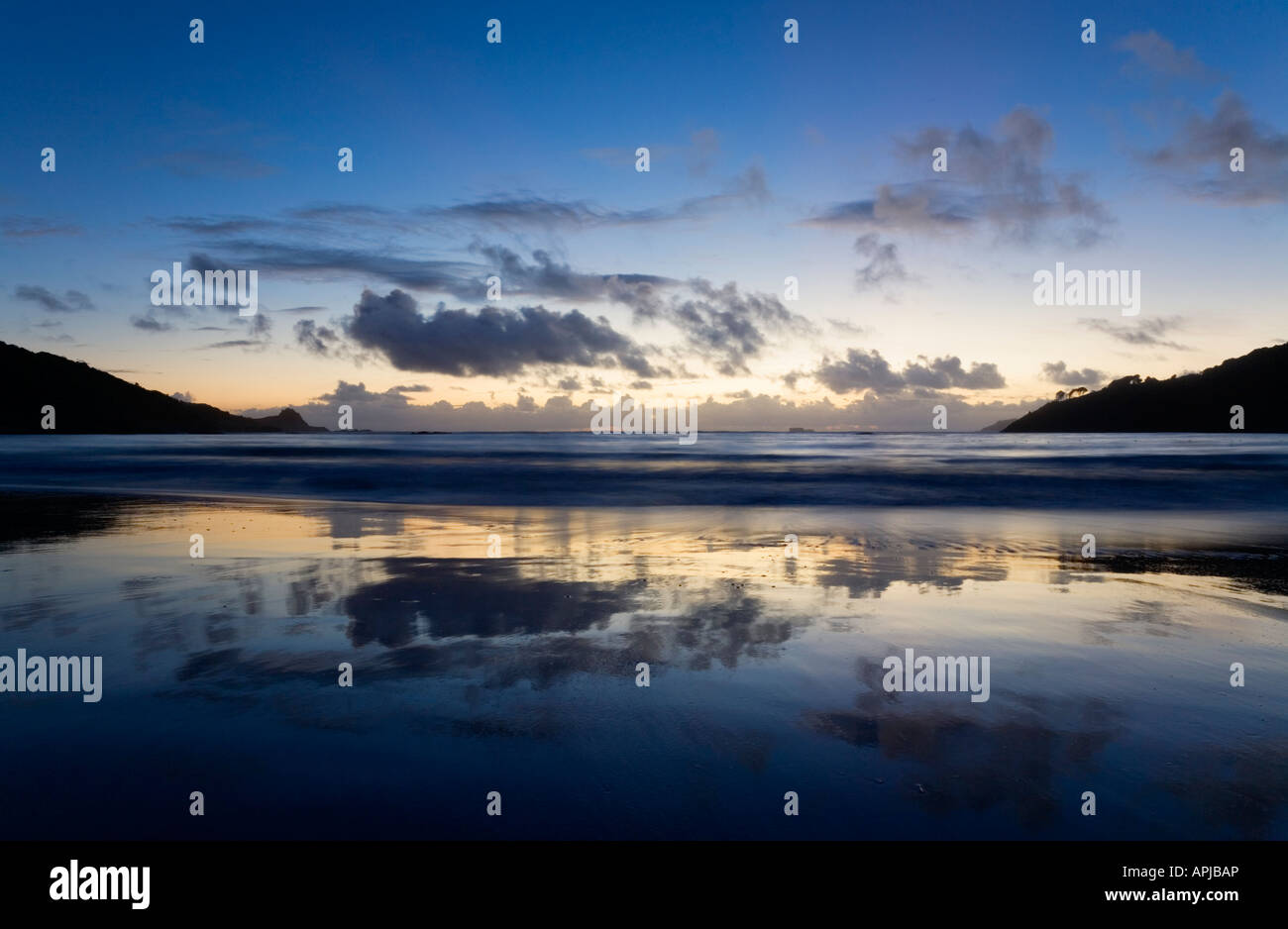 Beach at dawn Stock Photo - Alamy
