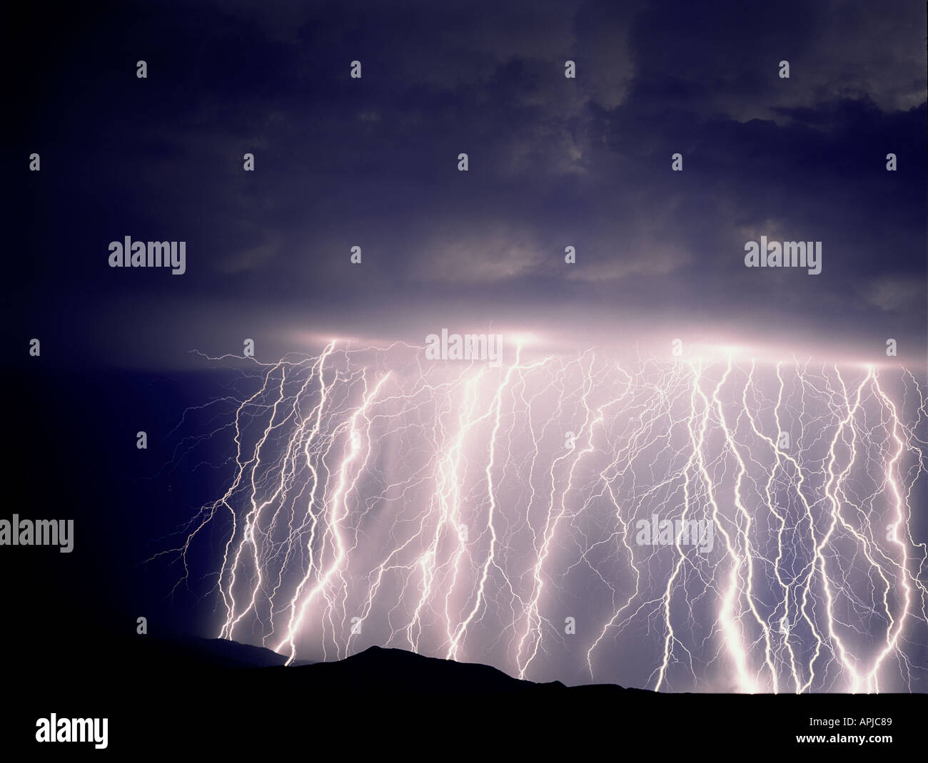 Lightning and monsoon rainstorm produces multiple strikes from dark ...