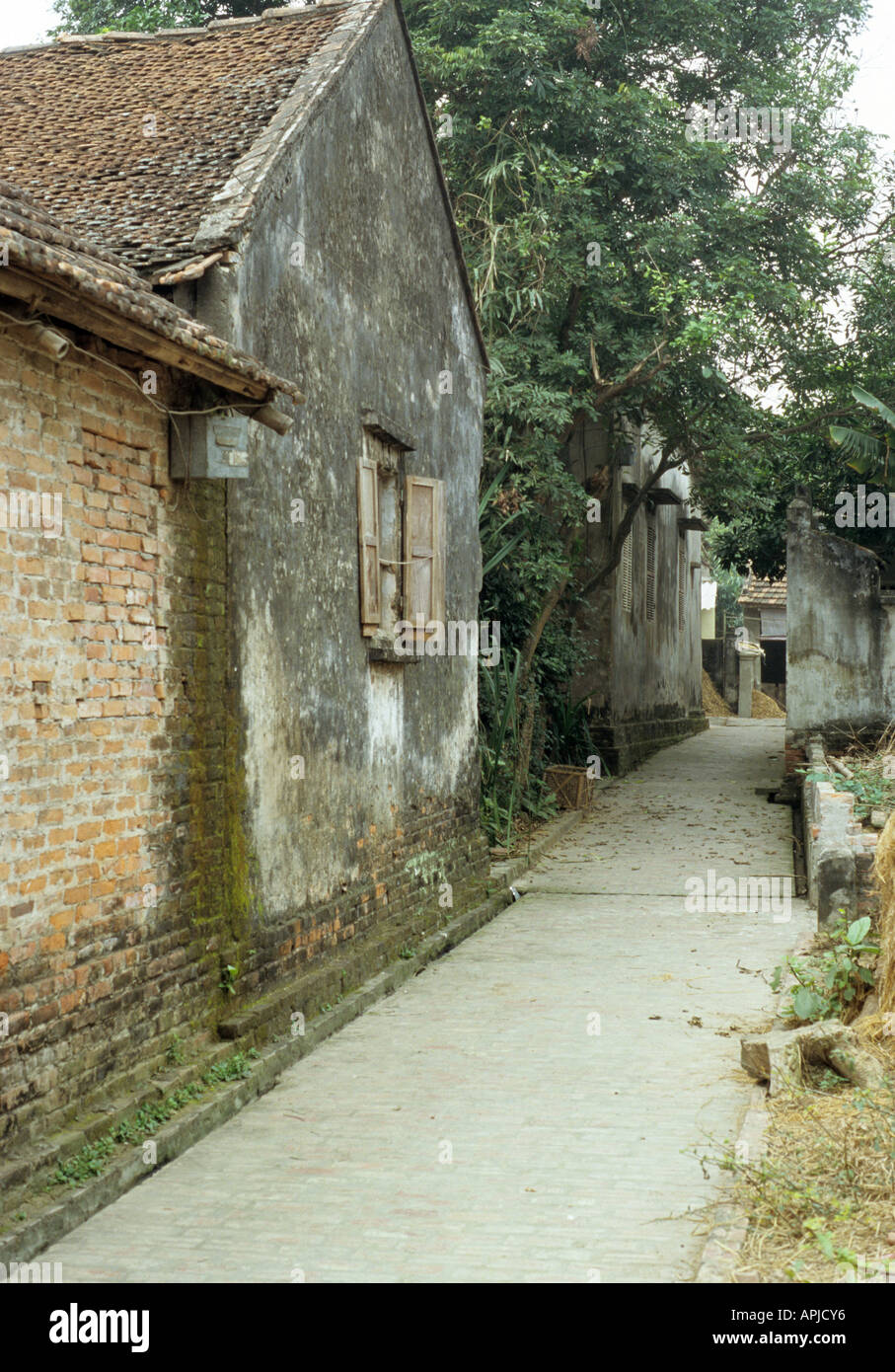Old weathered brick and render workshop buildings in a back lane, Dai ...