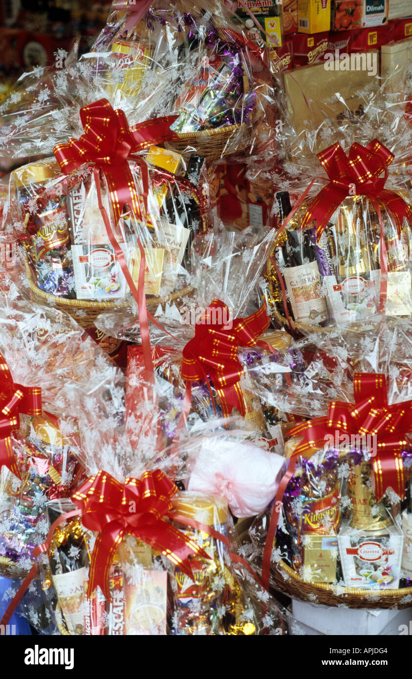 Food hampers in cellophane and ribbons for Tet Lunar New Year at a shop ...