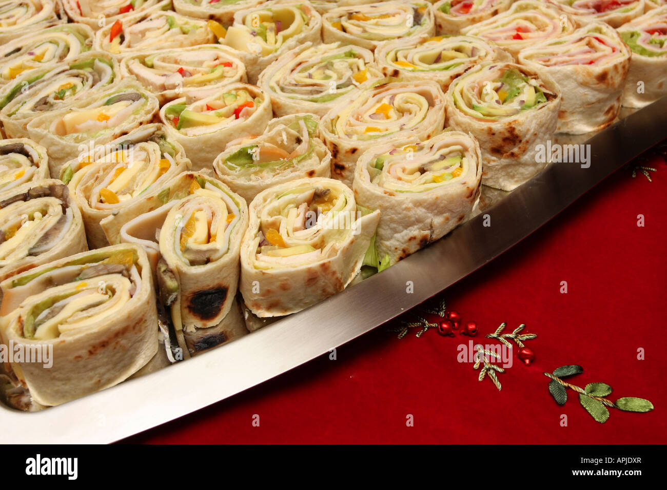 a plate full of snack sized mexican wraps Stock Photo - Alamy