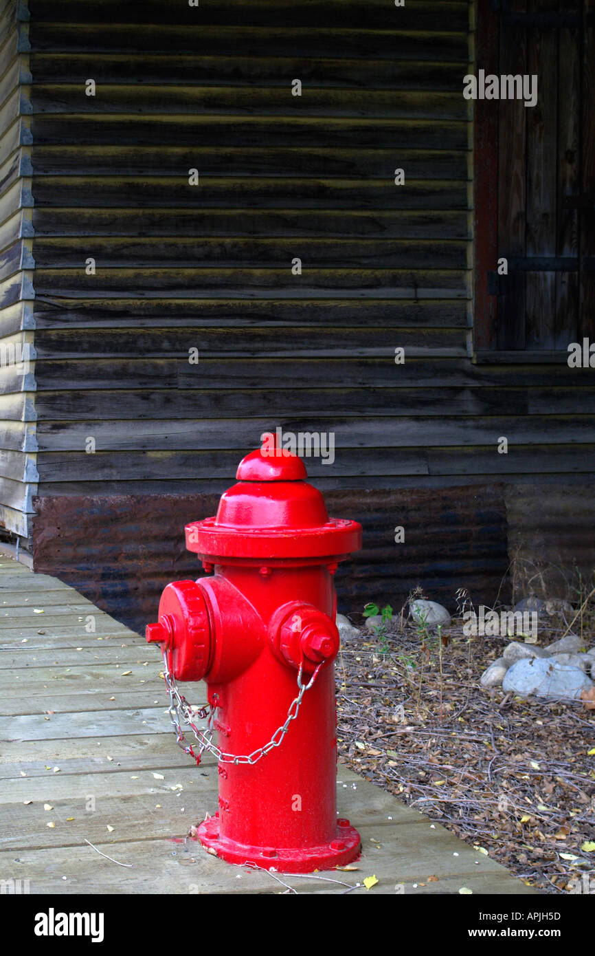 freshly painted bright red fire hydrant Stock Photo - Alamy