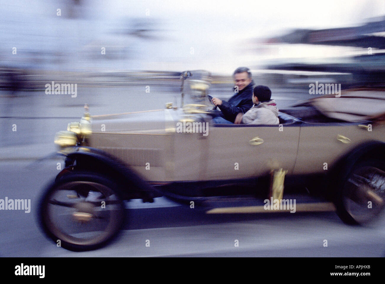 Driving old car, Barcelona Stock Photo - Alamy