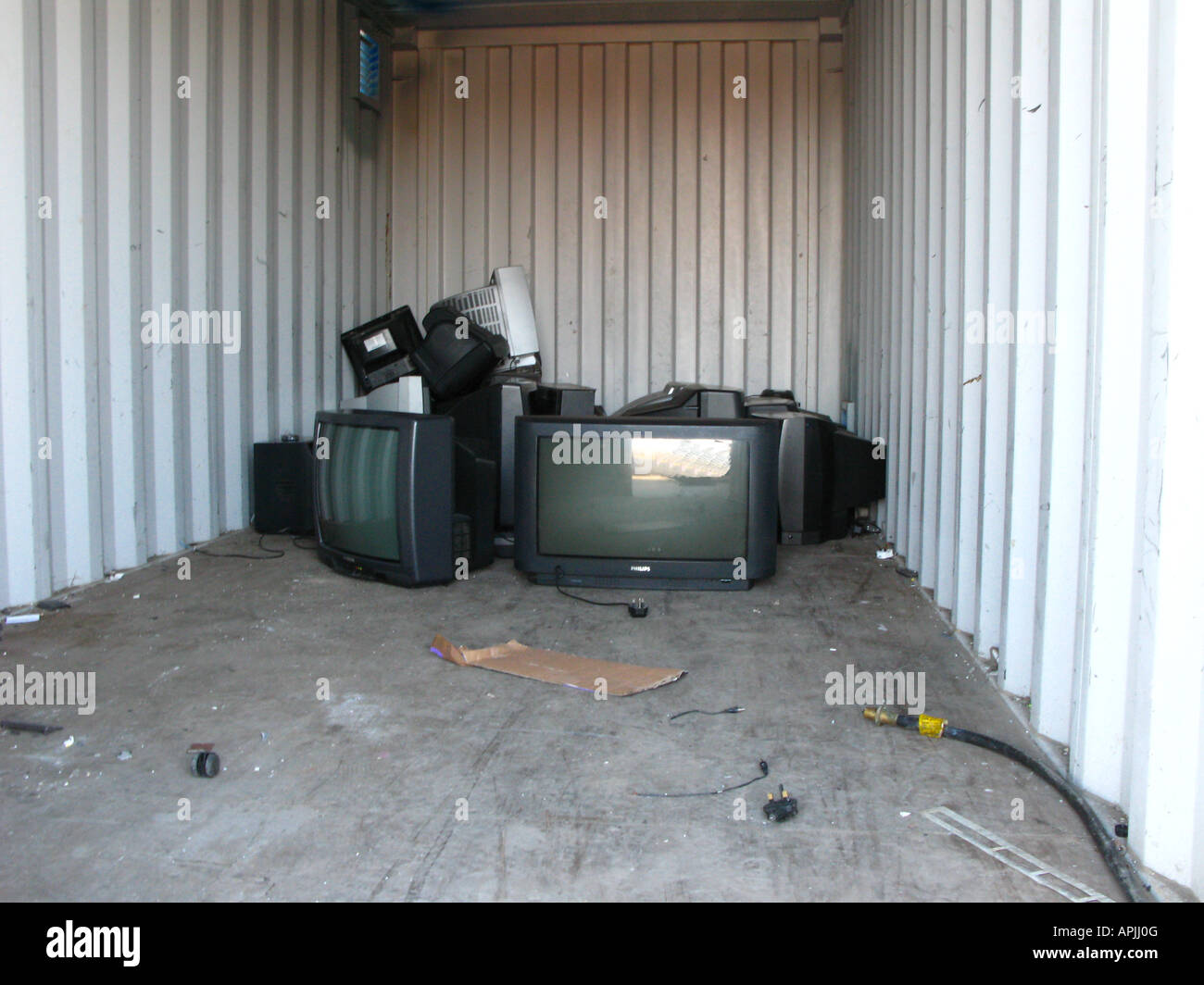 Television sets that have been sent for recycling held within in a ...