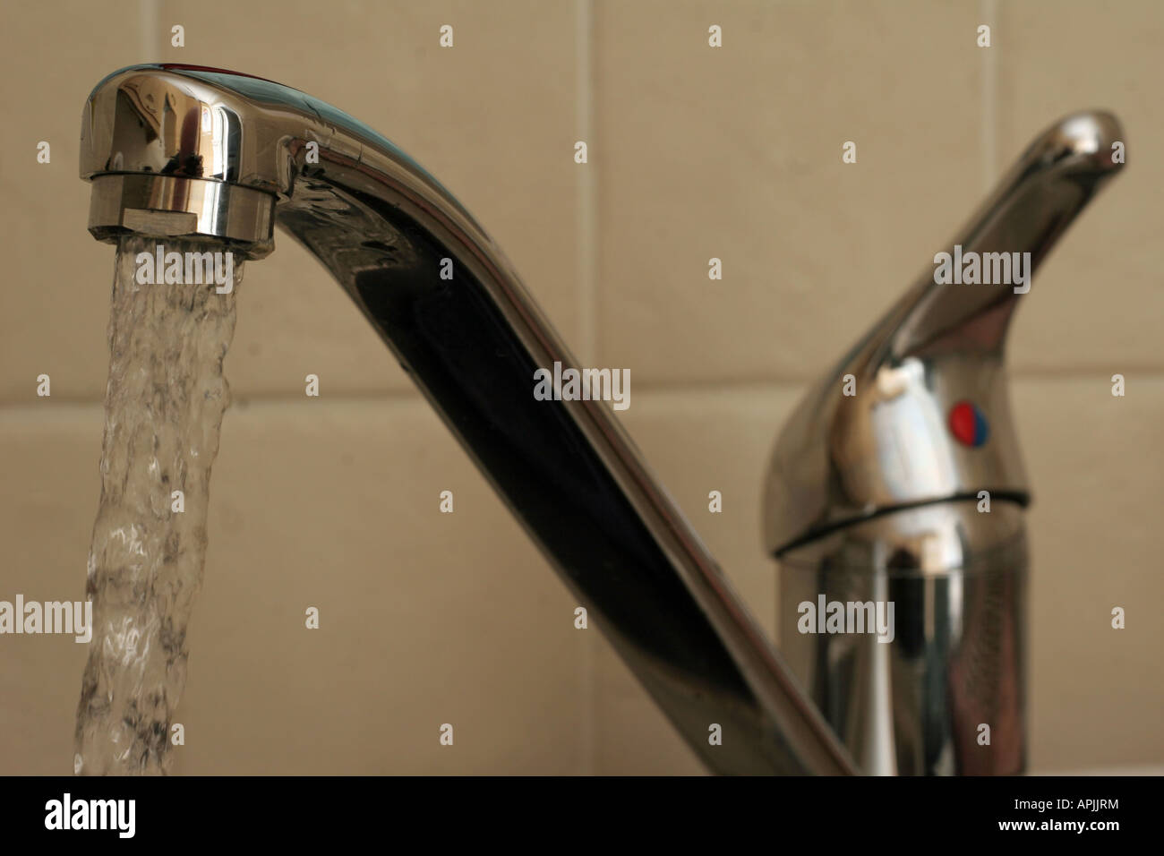 Tap with Running water Stock Photo - Alamy