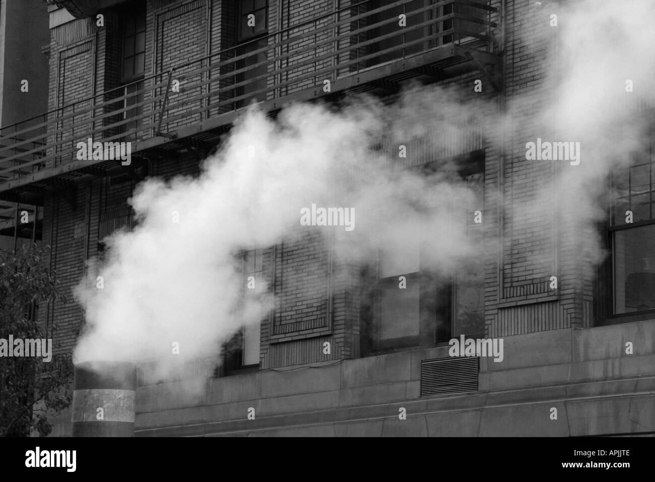 Steam from a funnel in Manhattan NYC Stock Photo - Alamy