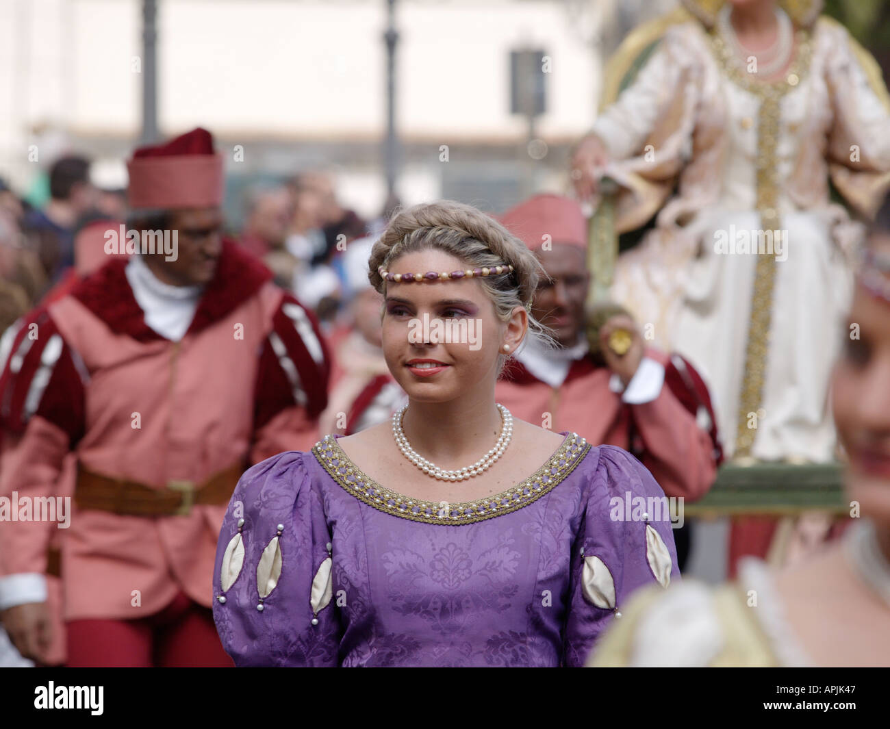 Venetian lady in waiting walking in procession ahead of the Queen of ...
