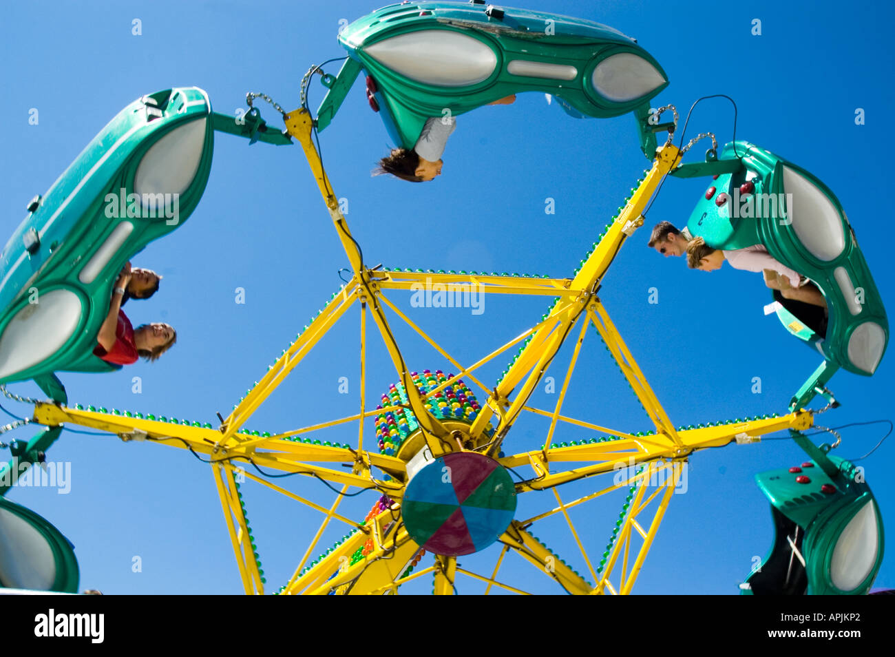 Spinning carnival rides hi-res stock photography and images - Alamy