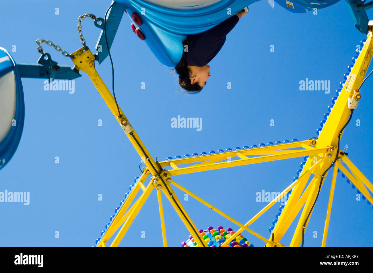 Spinning carnival rides hi-res stock photography and images - Alamy