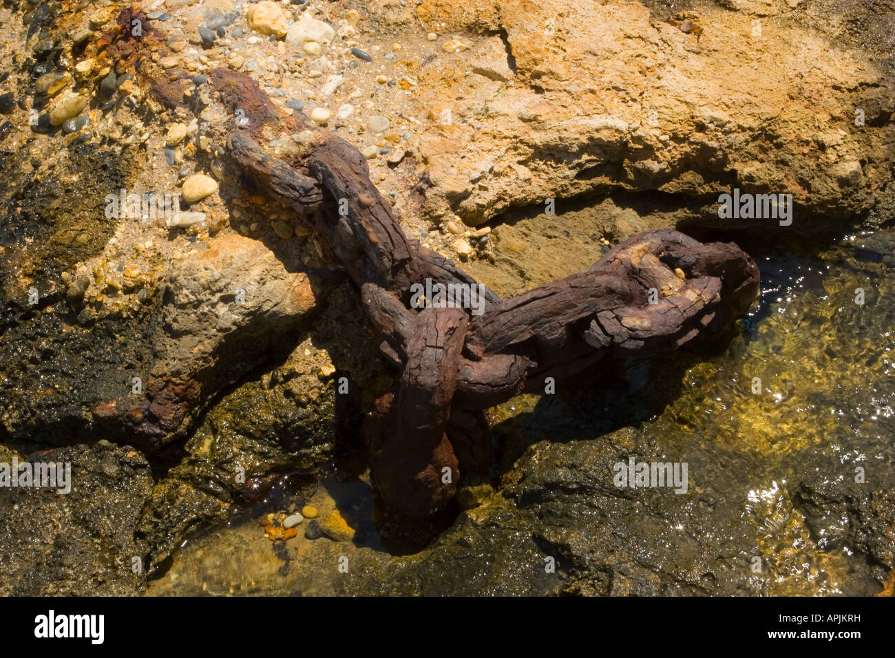 Old rusty chains of boats in Koufonisia Greece Stock Photo - Alamy