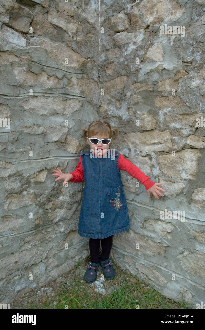 Little girl cornered Stock Photo - Alamy