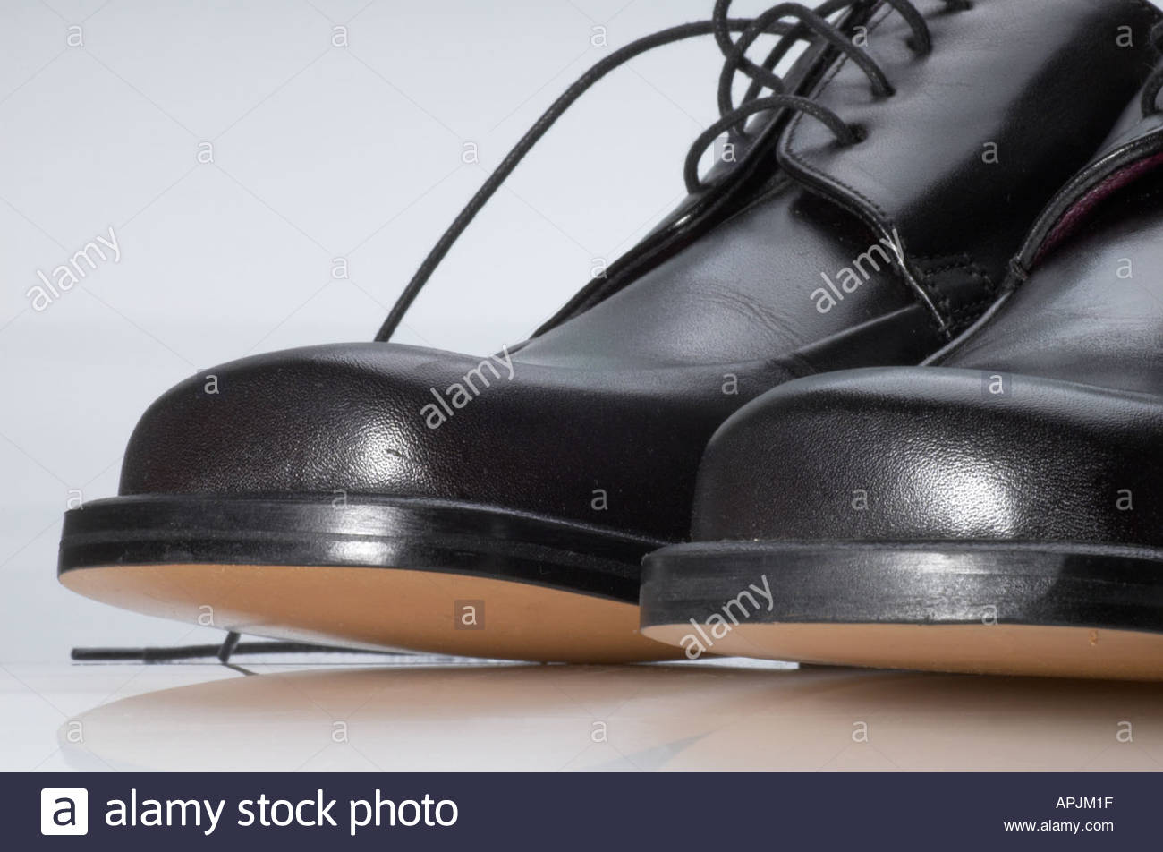 A pair of shiny black shoes Stock Photo - Alamy