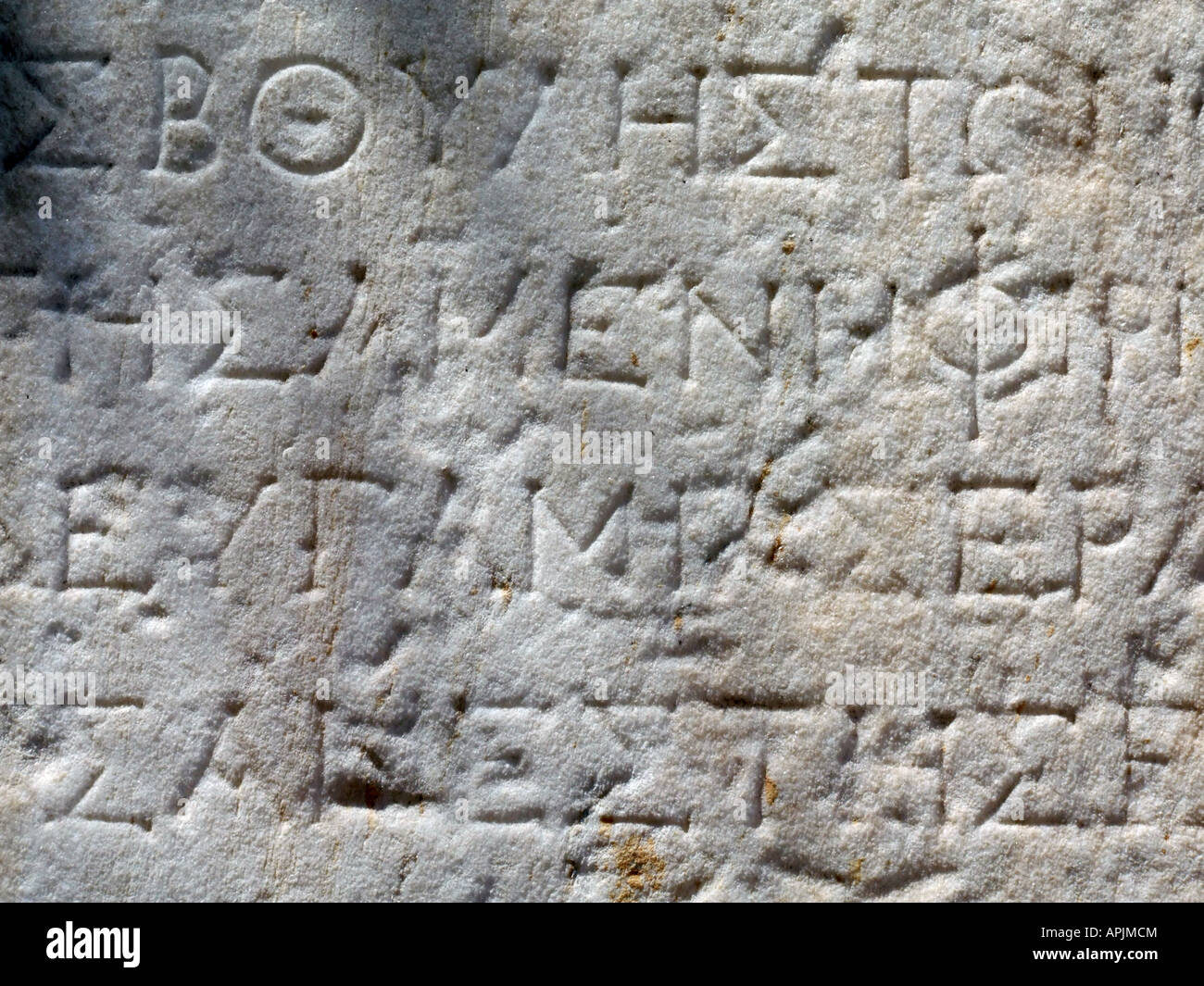 greek inscription in stone in athens greece Stock Photo - Alamy