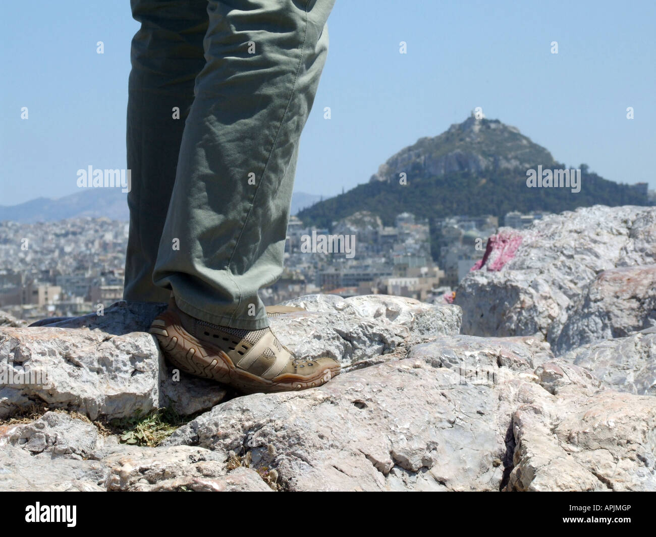 tourist with Lykavittos hill in background in athens greece Stock Photo ...