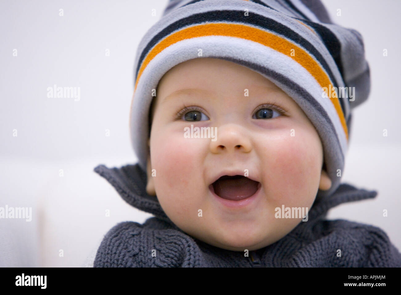 Portrait of a baby with a cap Stock Photo - Alamy