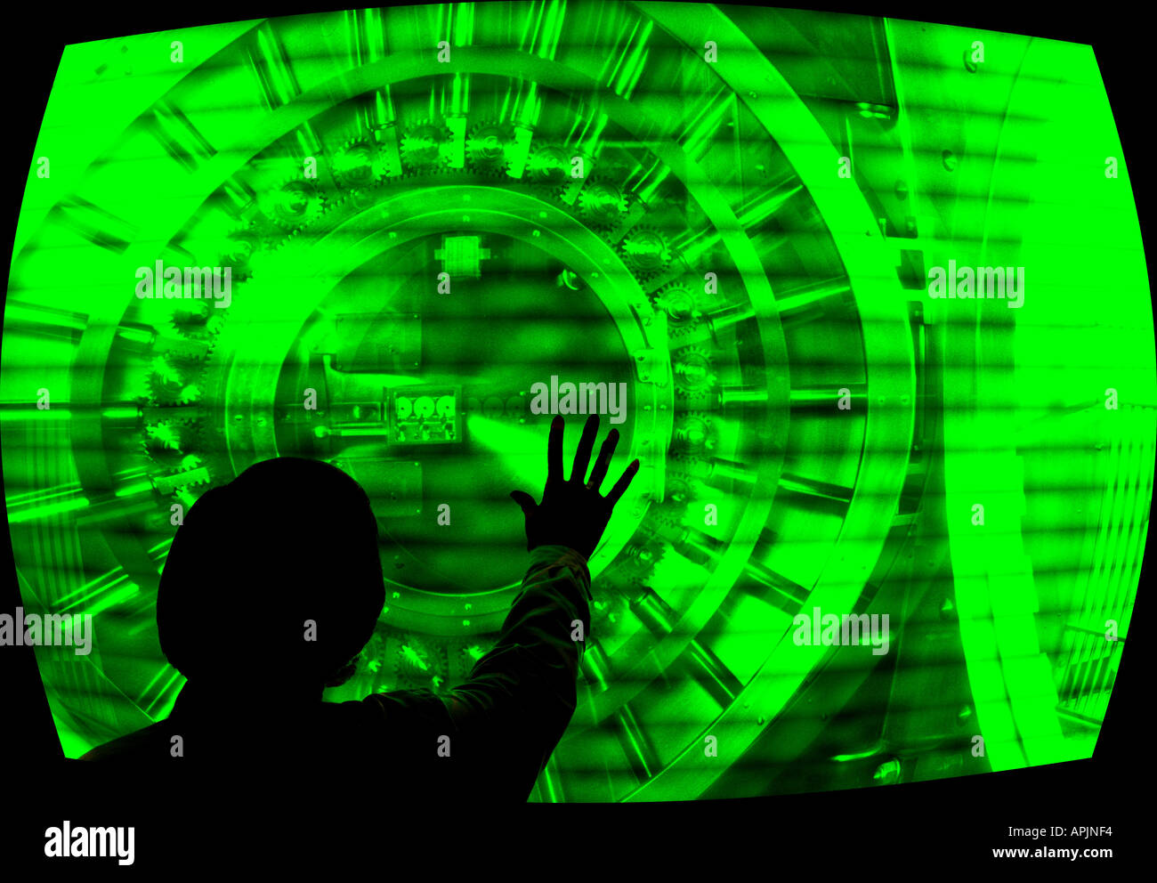 guard and circular vault in bank displayed on closed circuit security ...