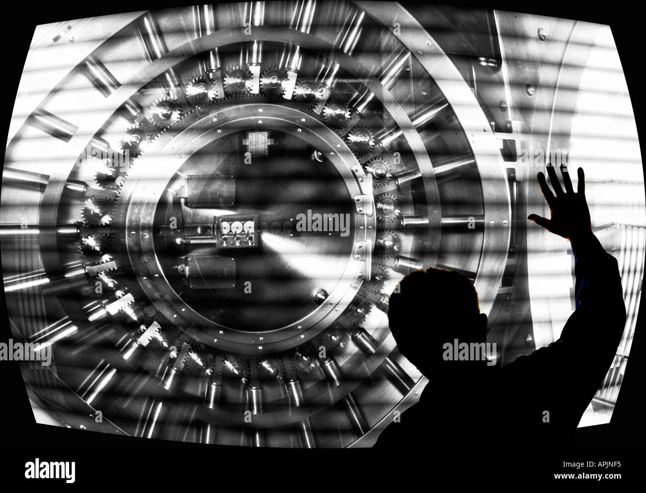 guard and circular vault in bank displayed on closed circuit security ...