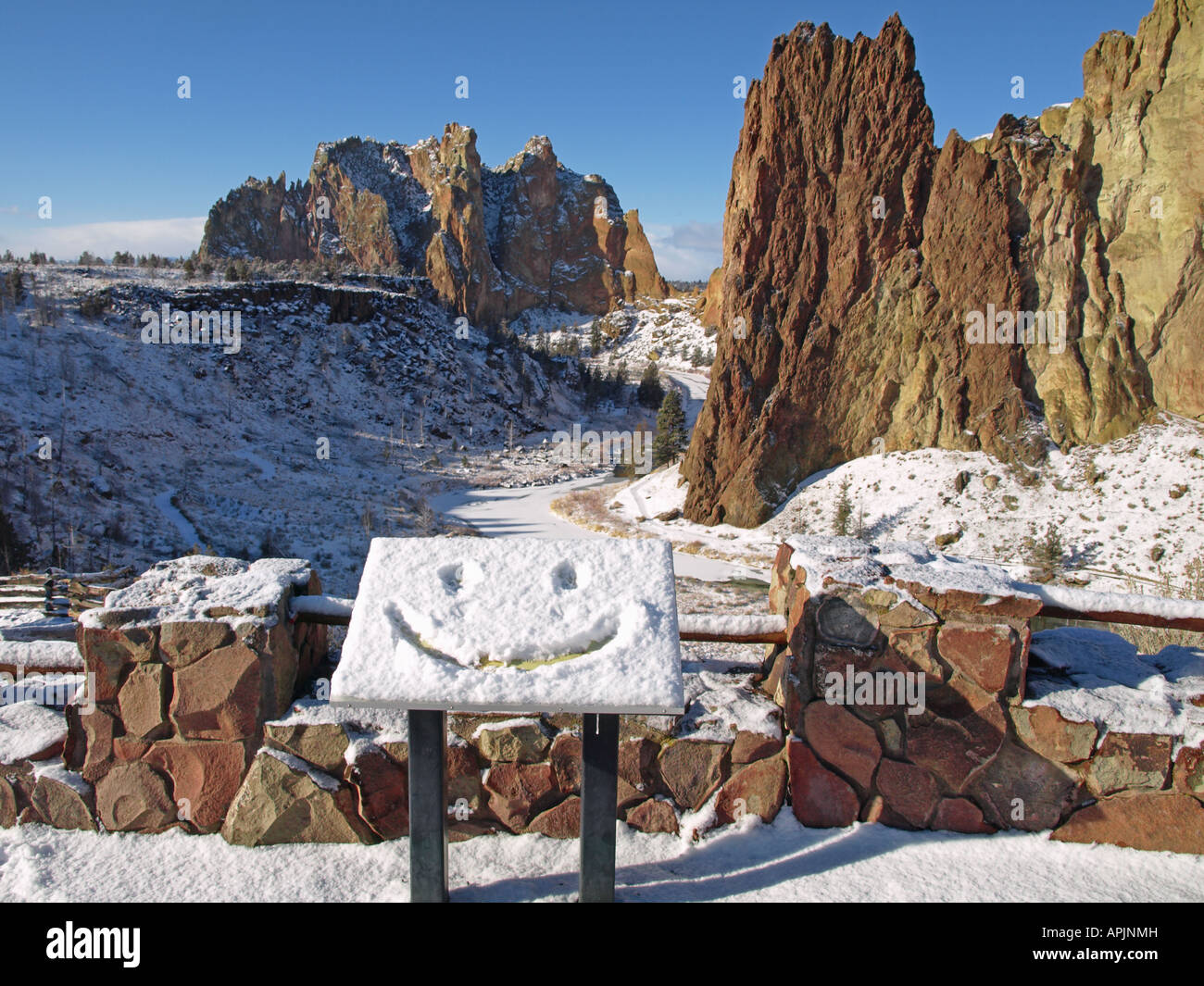 A smiley face sets off the sheer cliffs of Smith Rock with a dusting of ...