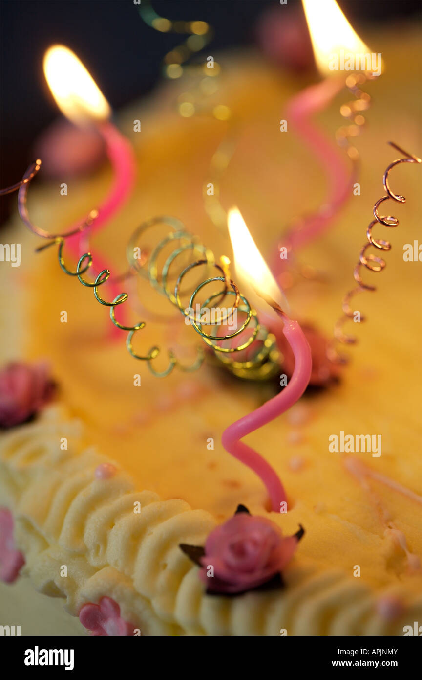 Candles on a birthday cake Stock Photo - Alamy