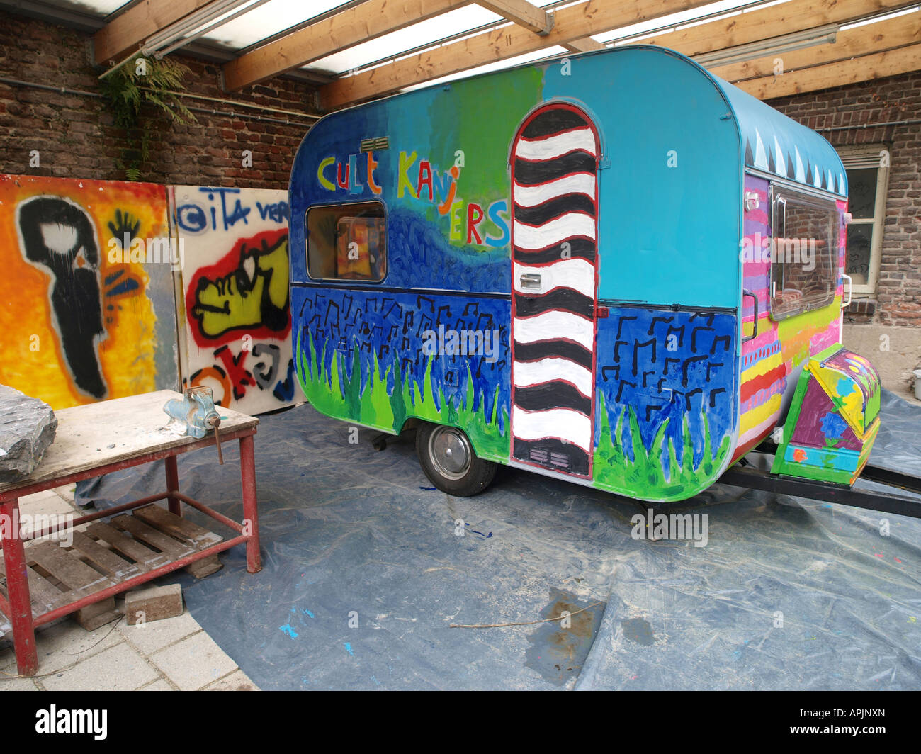 colourful caravan in storage shed Stock Photo - Alamy