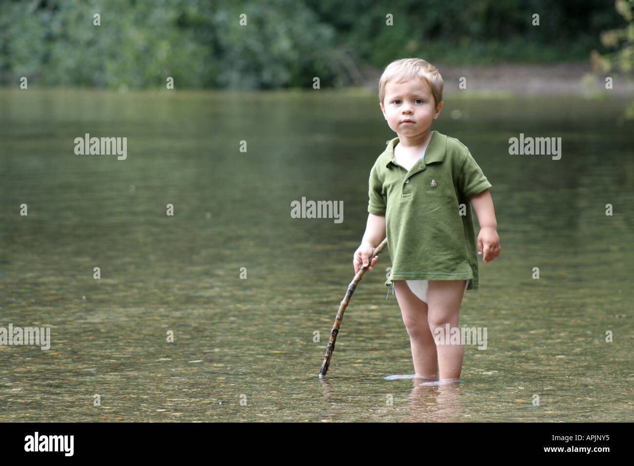 Child paddling stream hi-res stock photography and images - Alamy