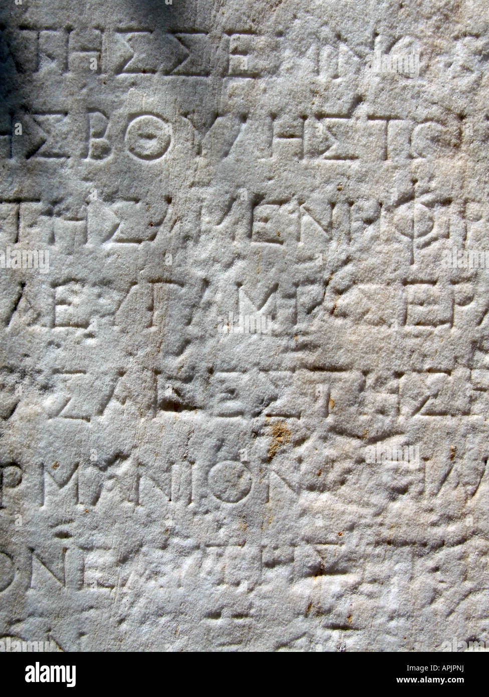 greek inscription in stone in athens greece Stock Photo - Alamy