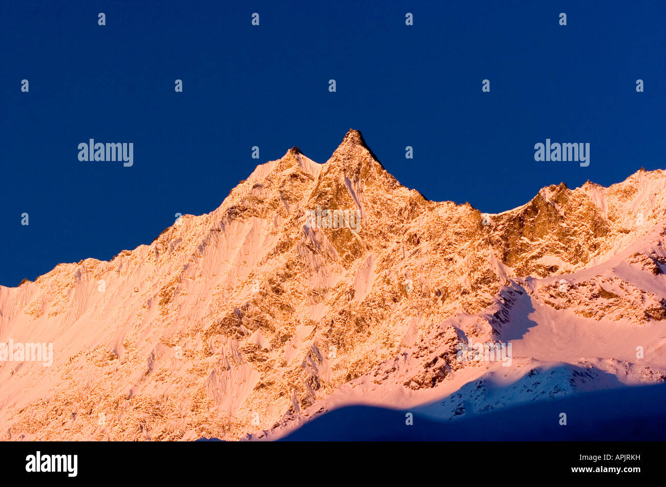 Lenzspitze 4294m peak at dawn in Saas Fee in the Wallis mountain range ...