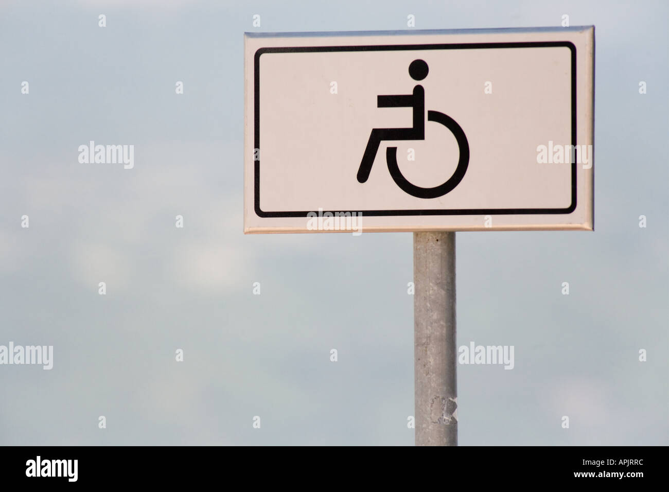 Wheelchair sign, beach reserved for disabled Stock Photo - Alamy