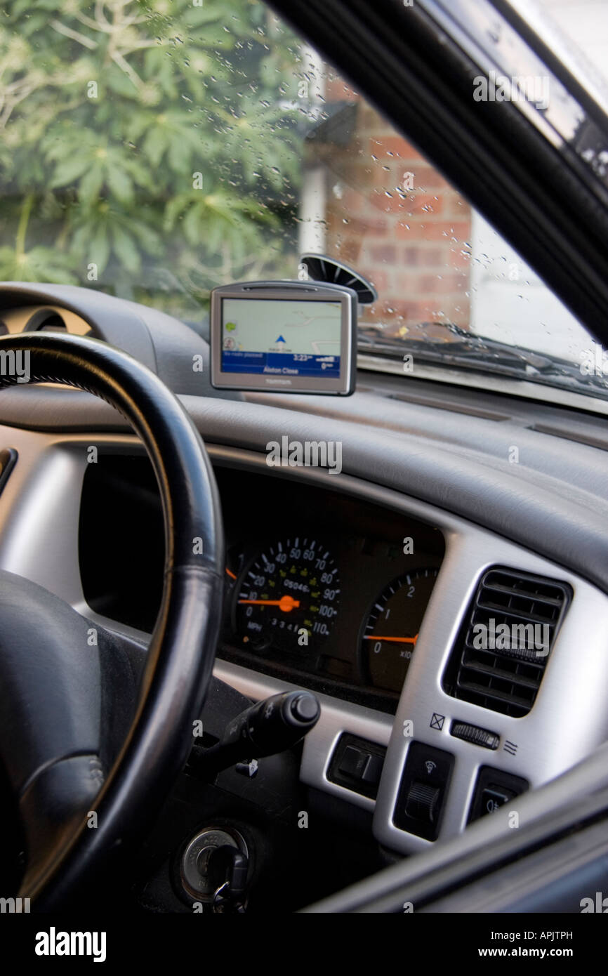 Open car window showing satellite navigation system on dashboard Stock ...