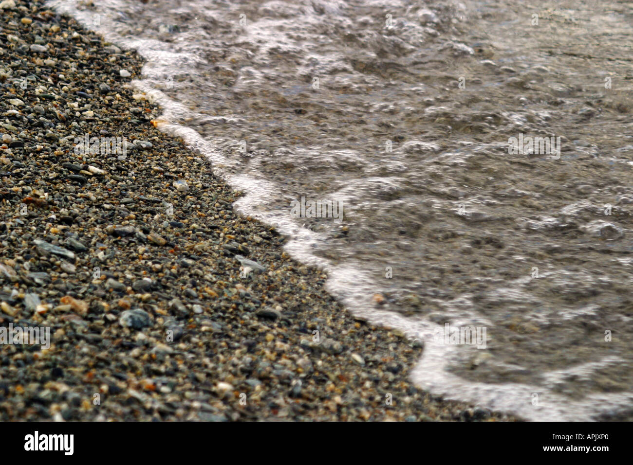 Beach background water coming onto hi-res stock photography and images ...