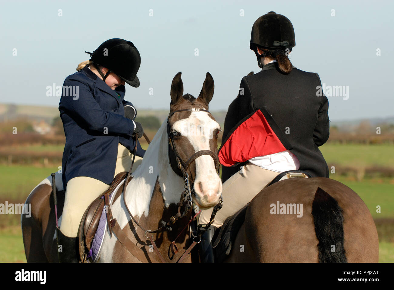 Two girls on horseback hi-res stock photography and images - Alamy