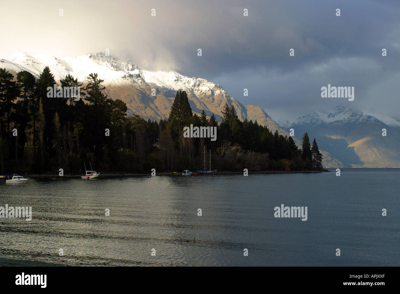 View of Cecil Peak snow capped mountain and Lake Wakaitipu Queenstown ...