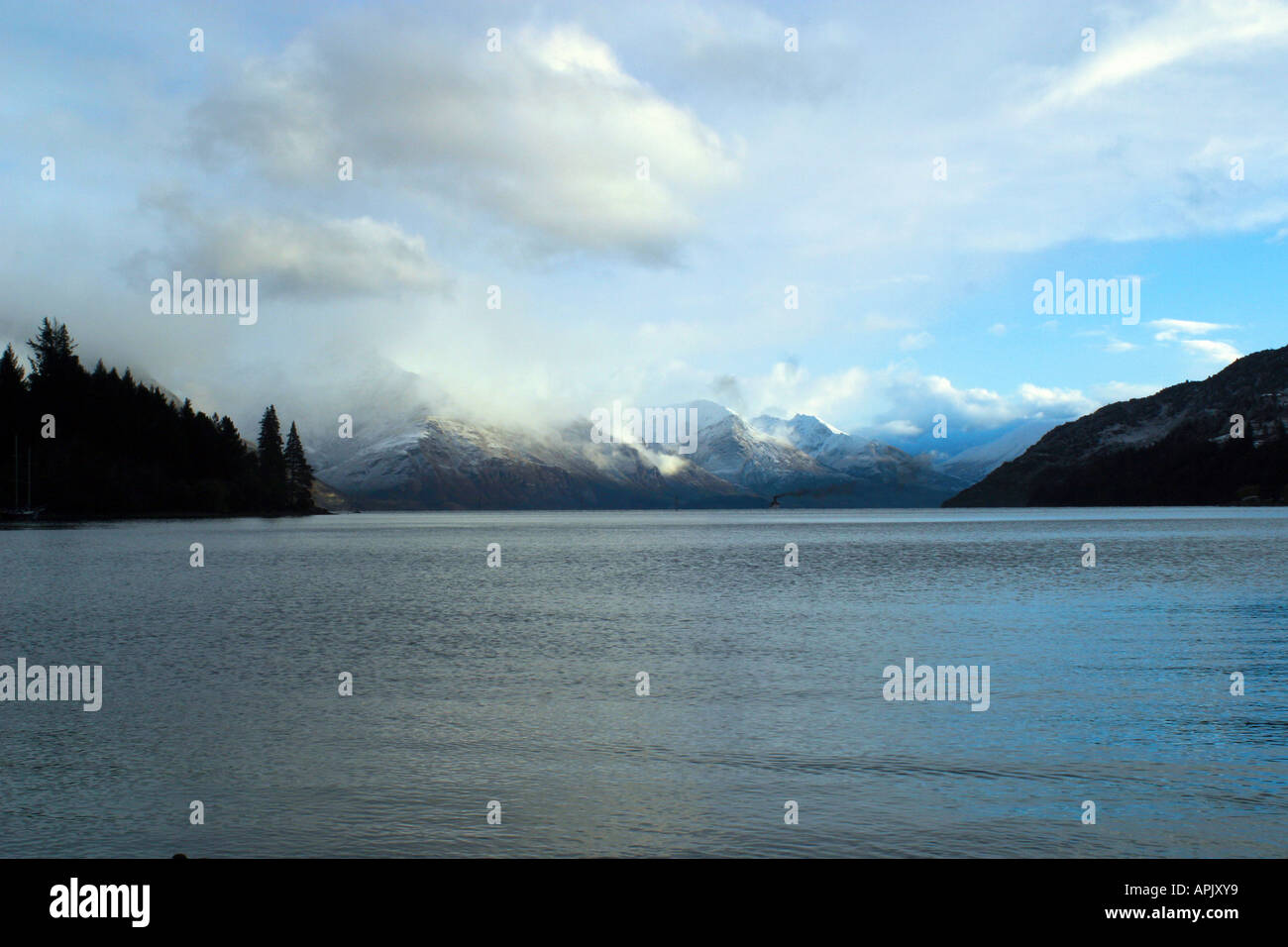 View of Cecil Peak snow capped mountain and Lake Wakaitipu Queenstown ...