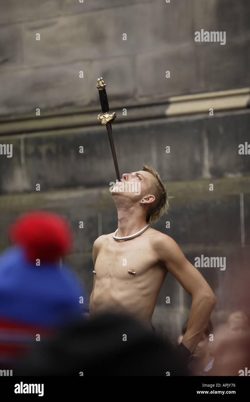 Sword swallowing hi-res stock photography and images - Alamy