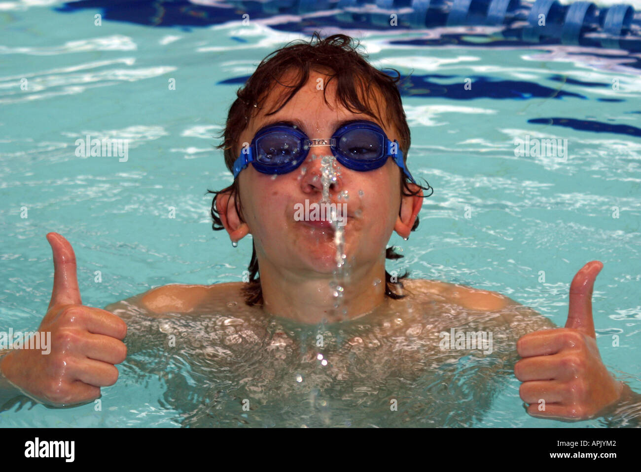 Boy spitting water hi-res stock photography and images - Alamy