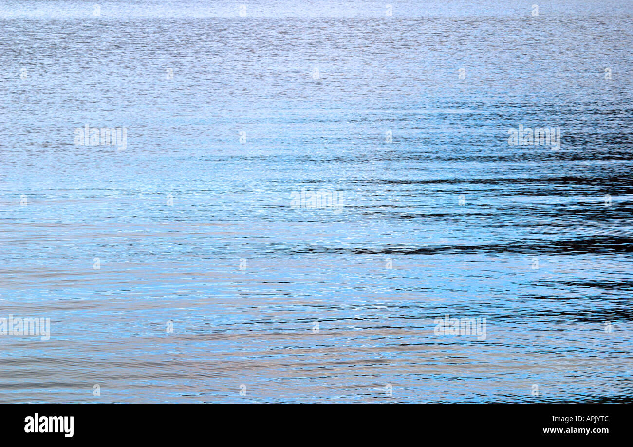 Sun reflecting on Water surface Stock Photo - Alamy